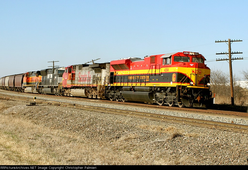 KCSM 4094, BNSF 652, NS 2604, and BNSF 981